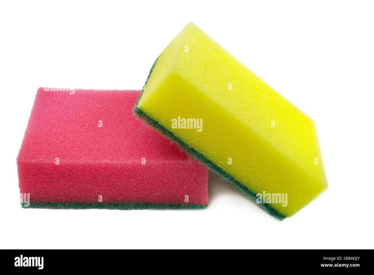 Two sponges for cleaning from contaminations of red and yellow color ...