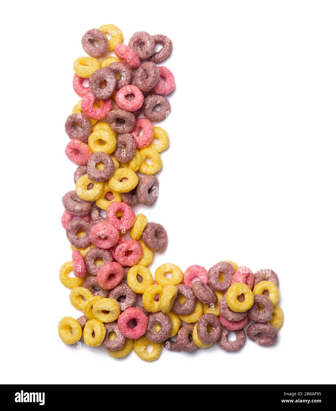 Letter L of the English alphabet from pink colored flakes on a white ...