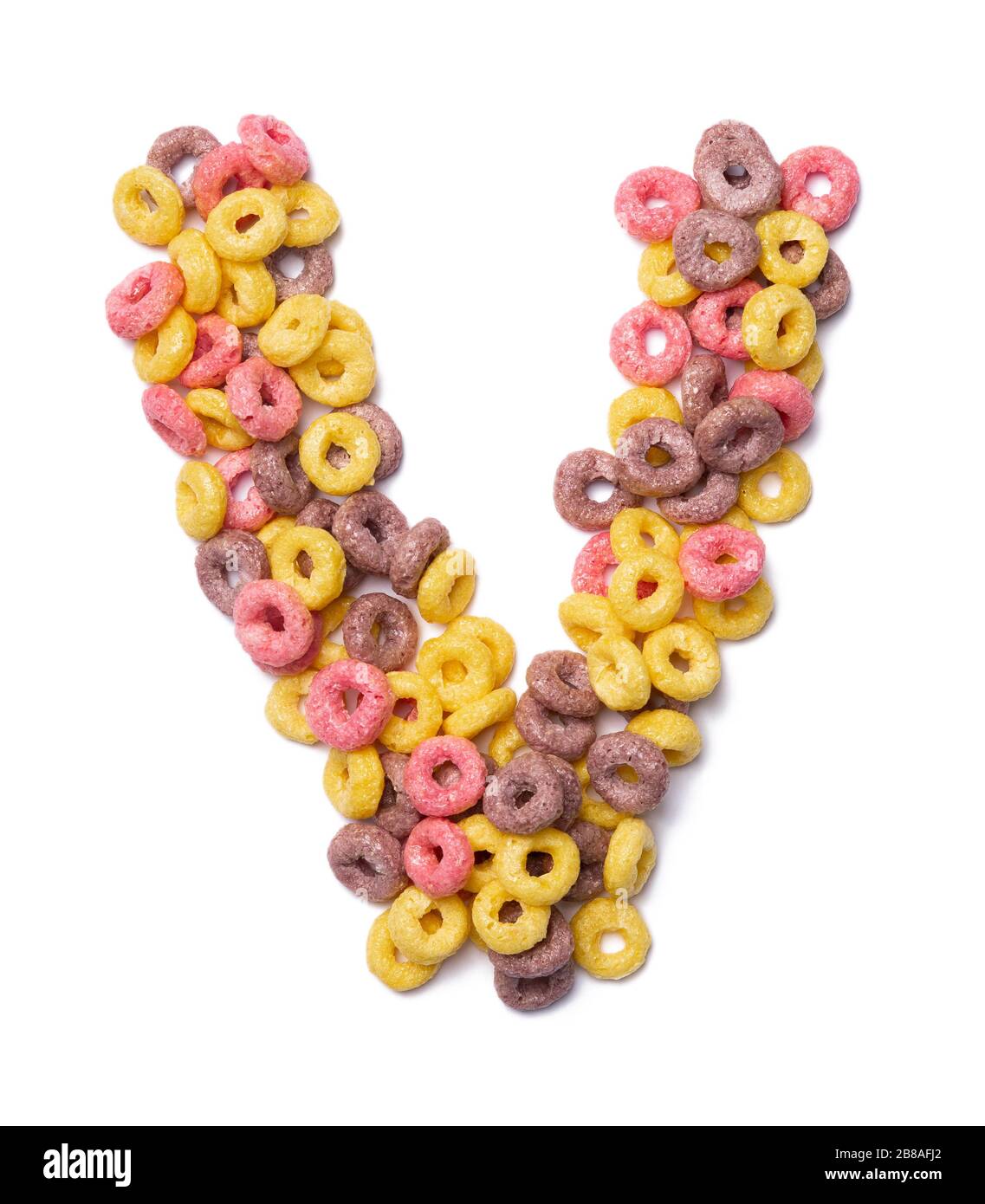 Letter V of the English alphabet from pink colored flakes on a white ...