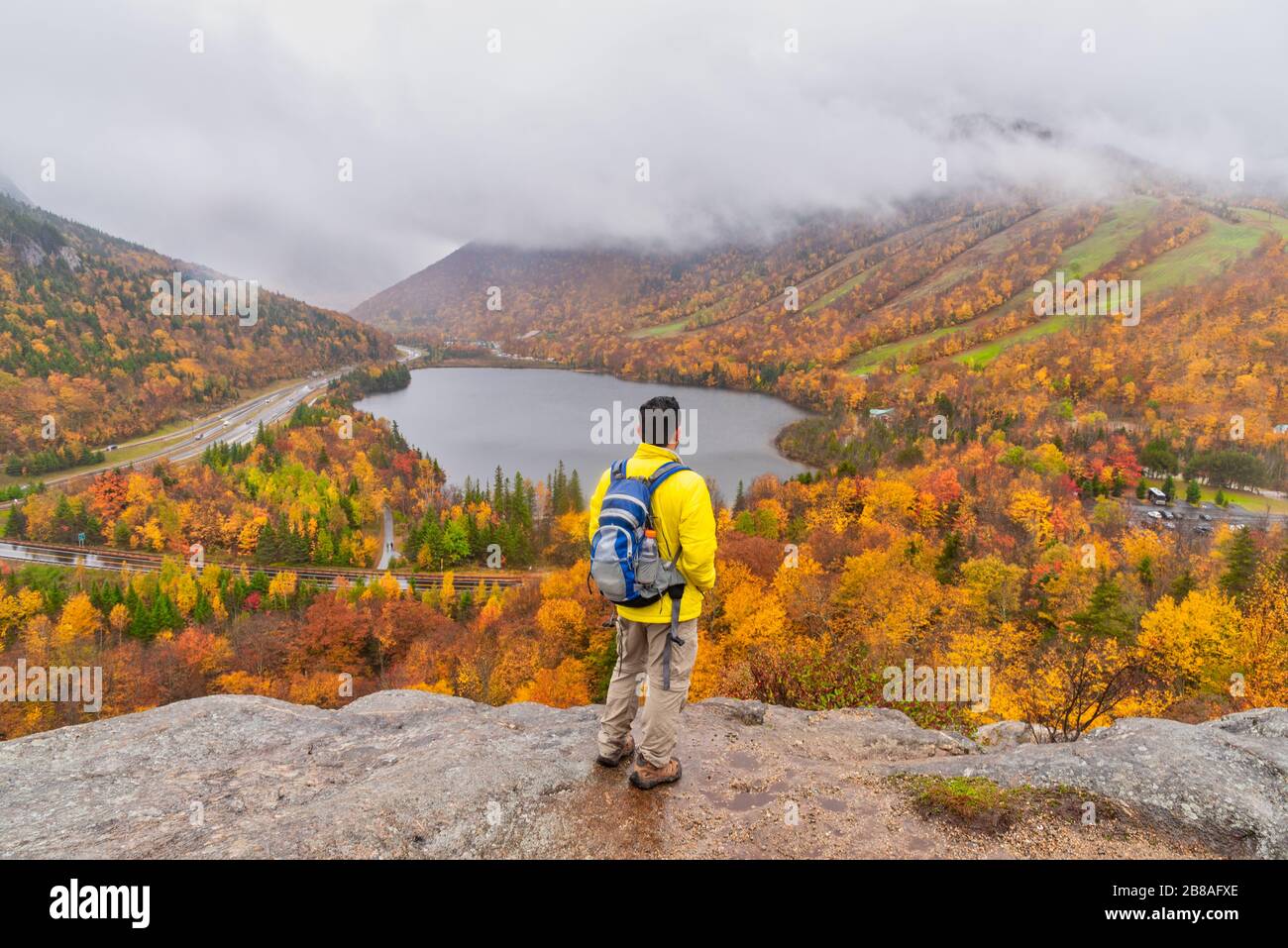 Man posing in front of beautiful Echo Lake from Artists Bluff Loop in ...