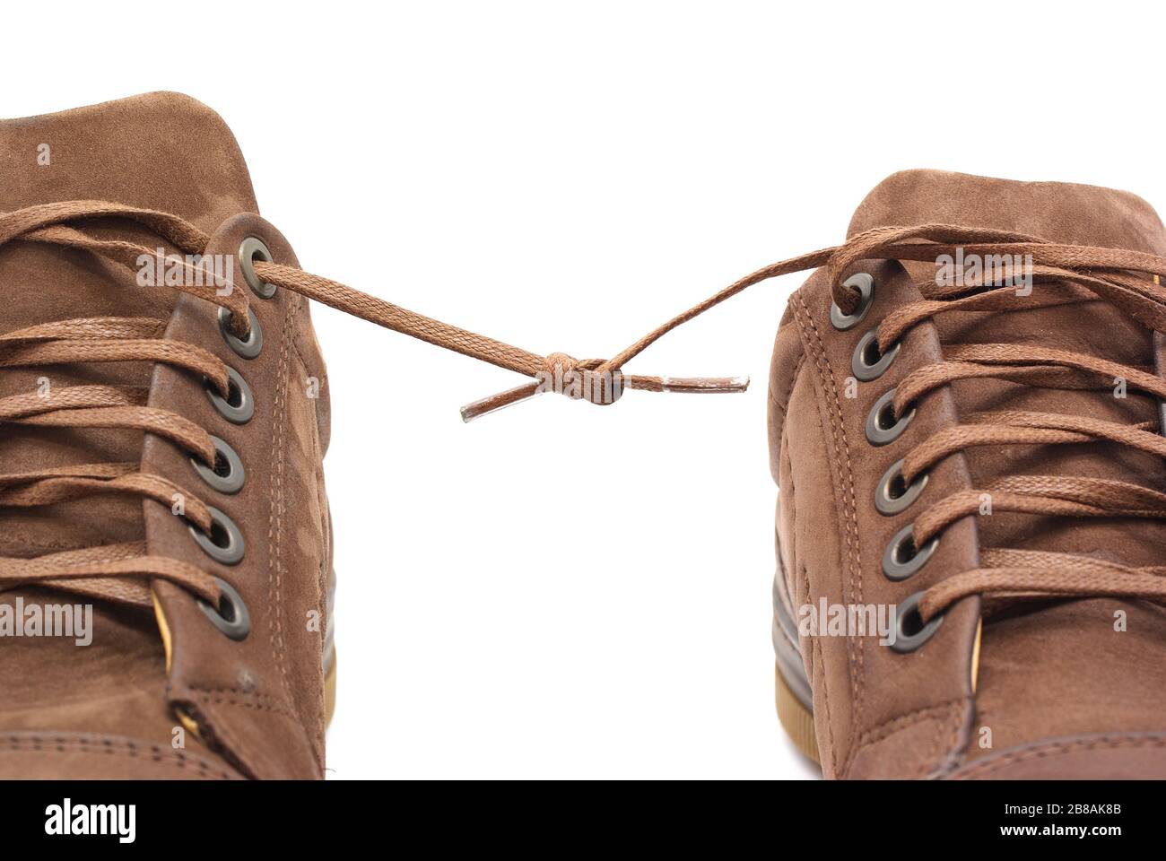 Pair of shoes bound together. Element of design Stock Photo - Alamy
