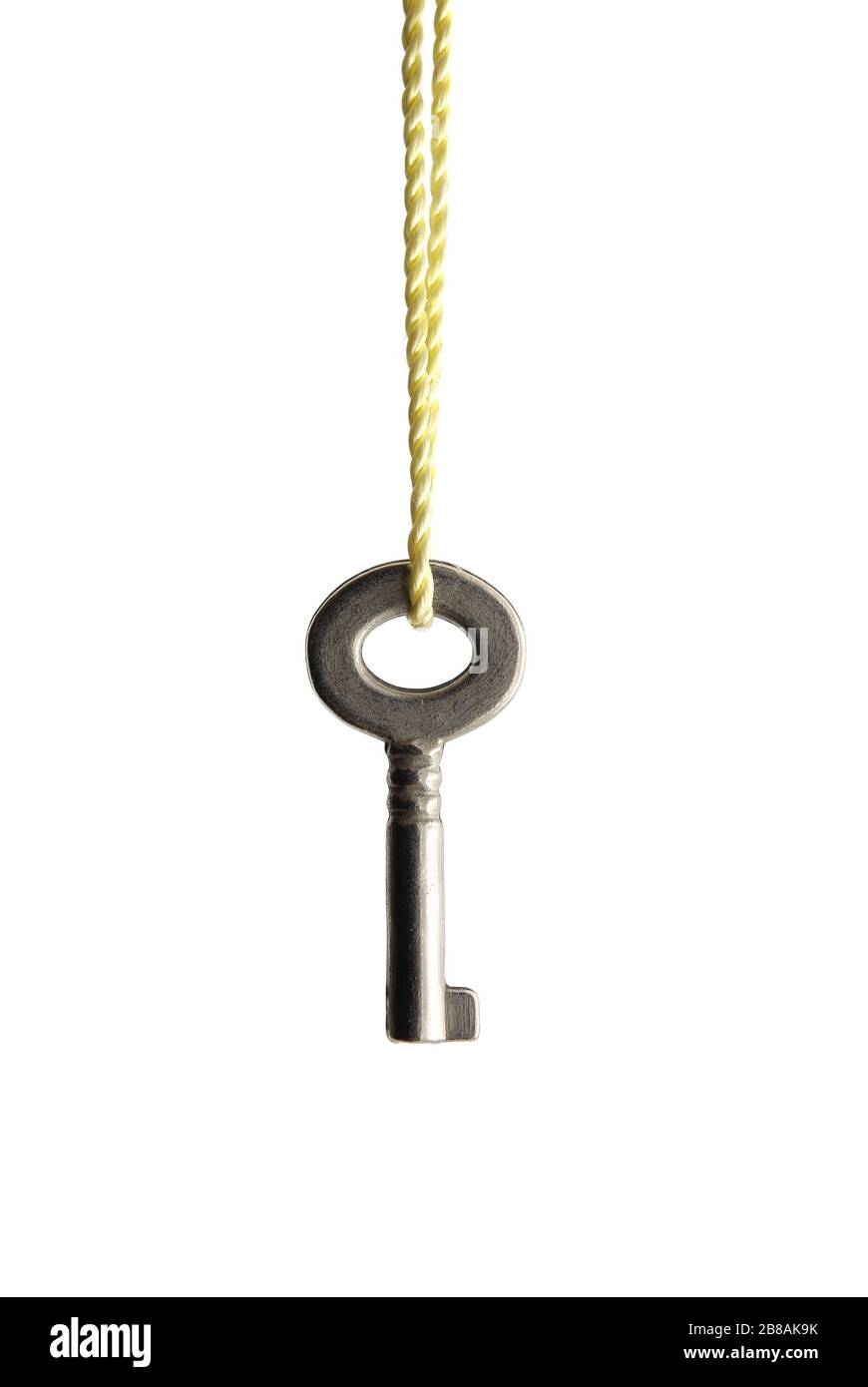 Small key hanging on a rope. Isolated object design Stock Photo - Alamy