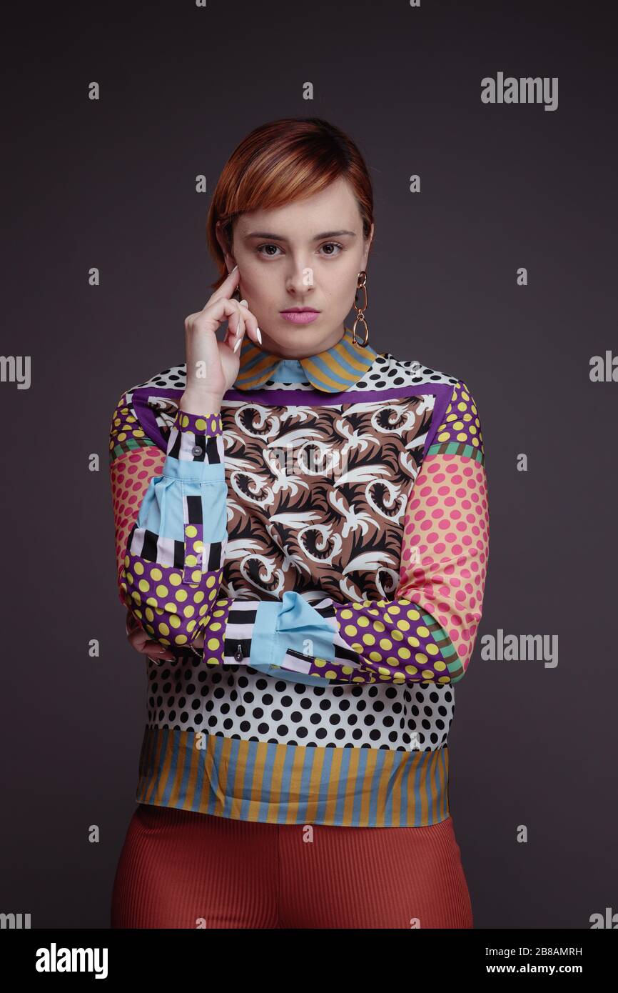 A model posing in a studio Stock Photo - Alamy