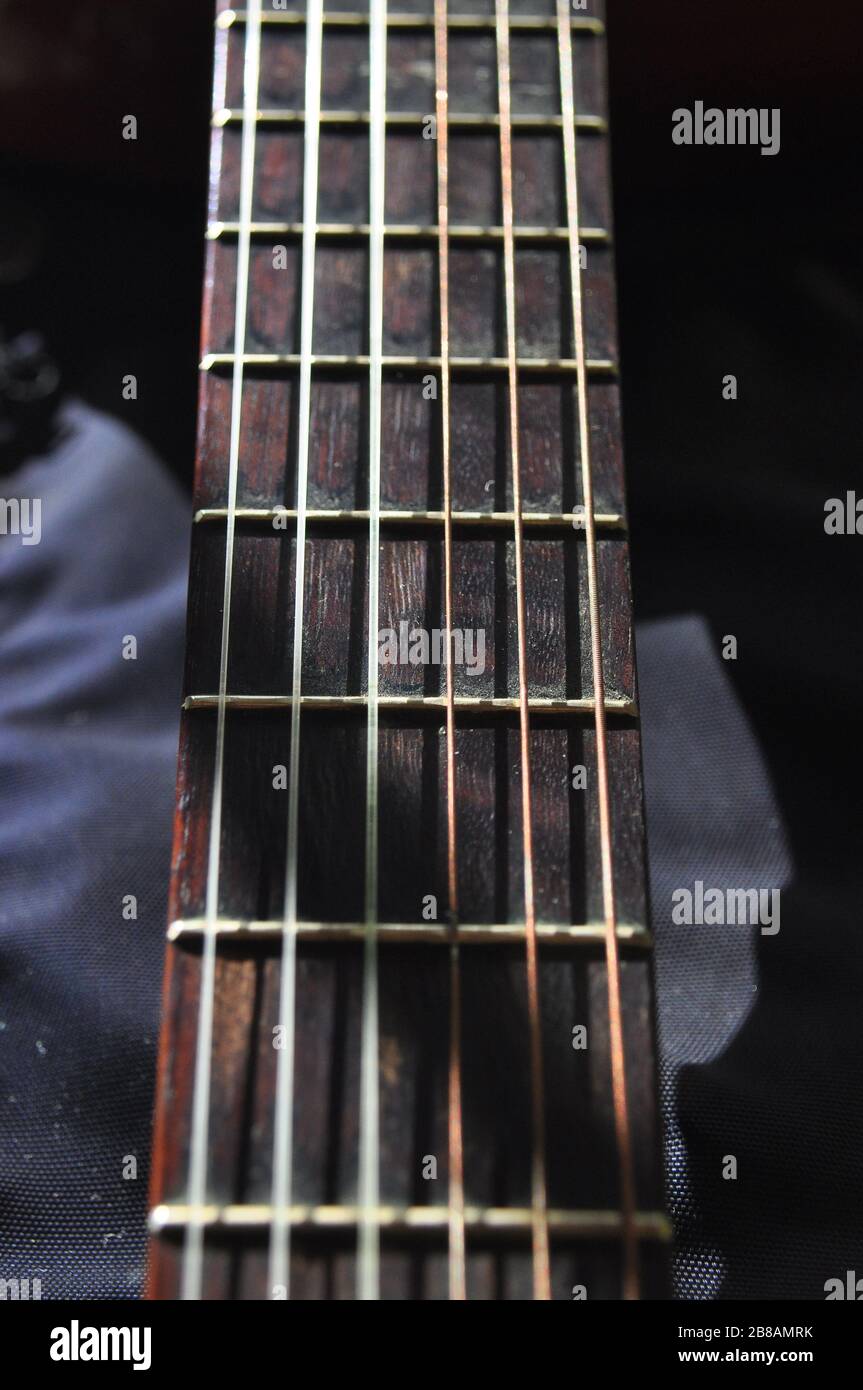 Classical guitar. Issuing a stringed instrument sounds. Fretboard ...