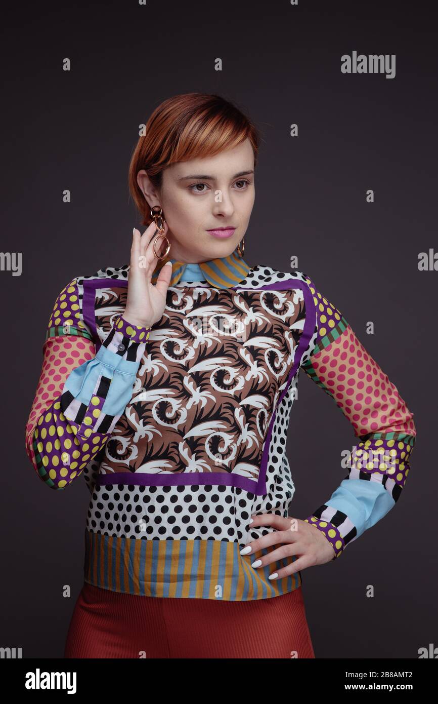 A model posing in a studio Stock Photo - Alamy