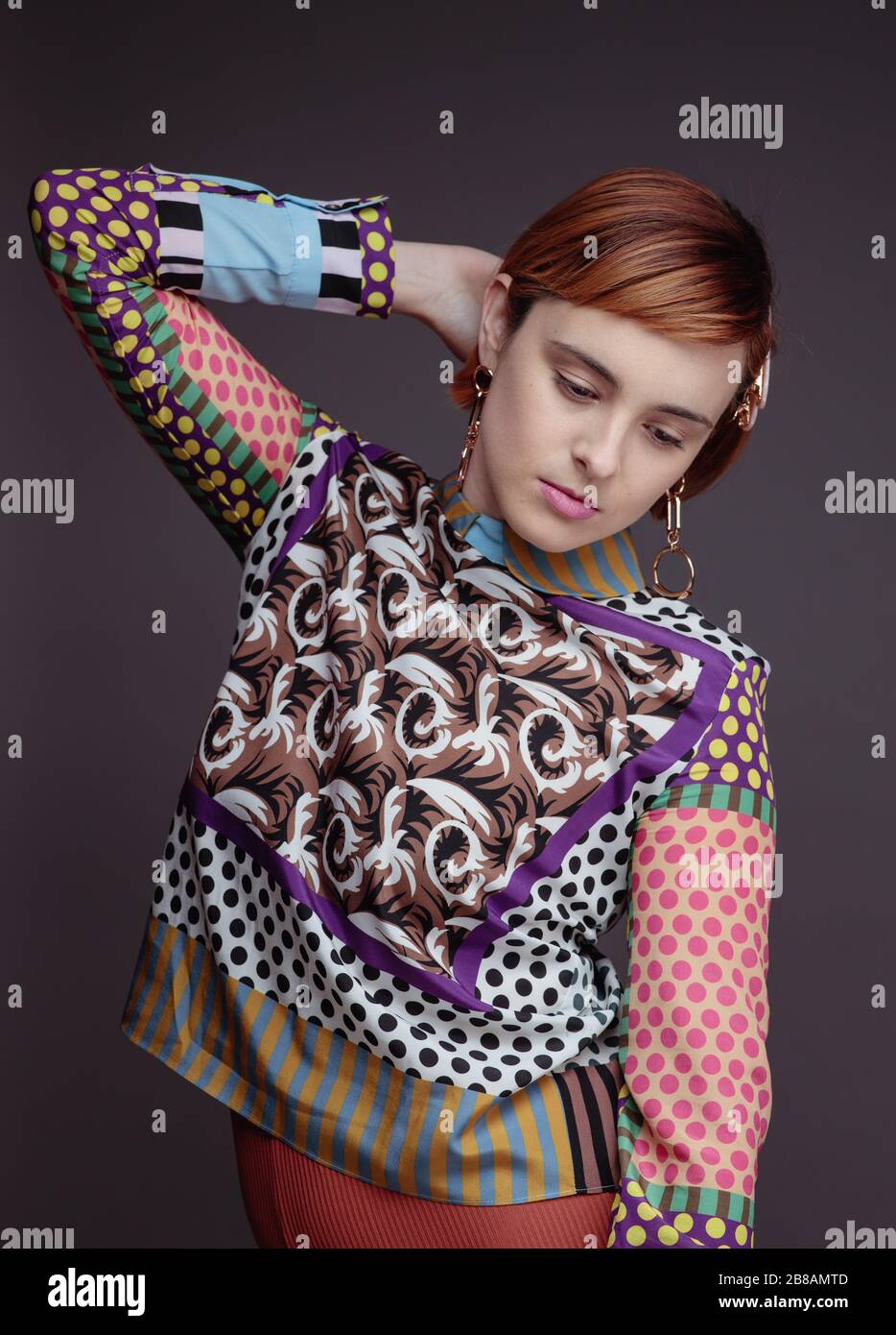 A model posing in a studio Stock Photo - Alamy