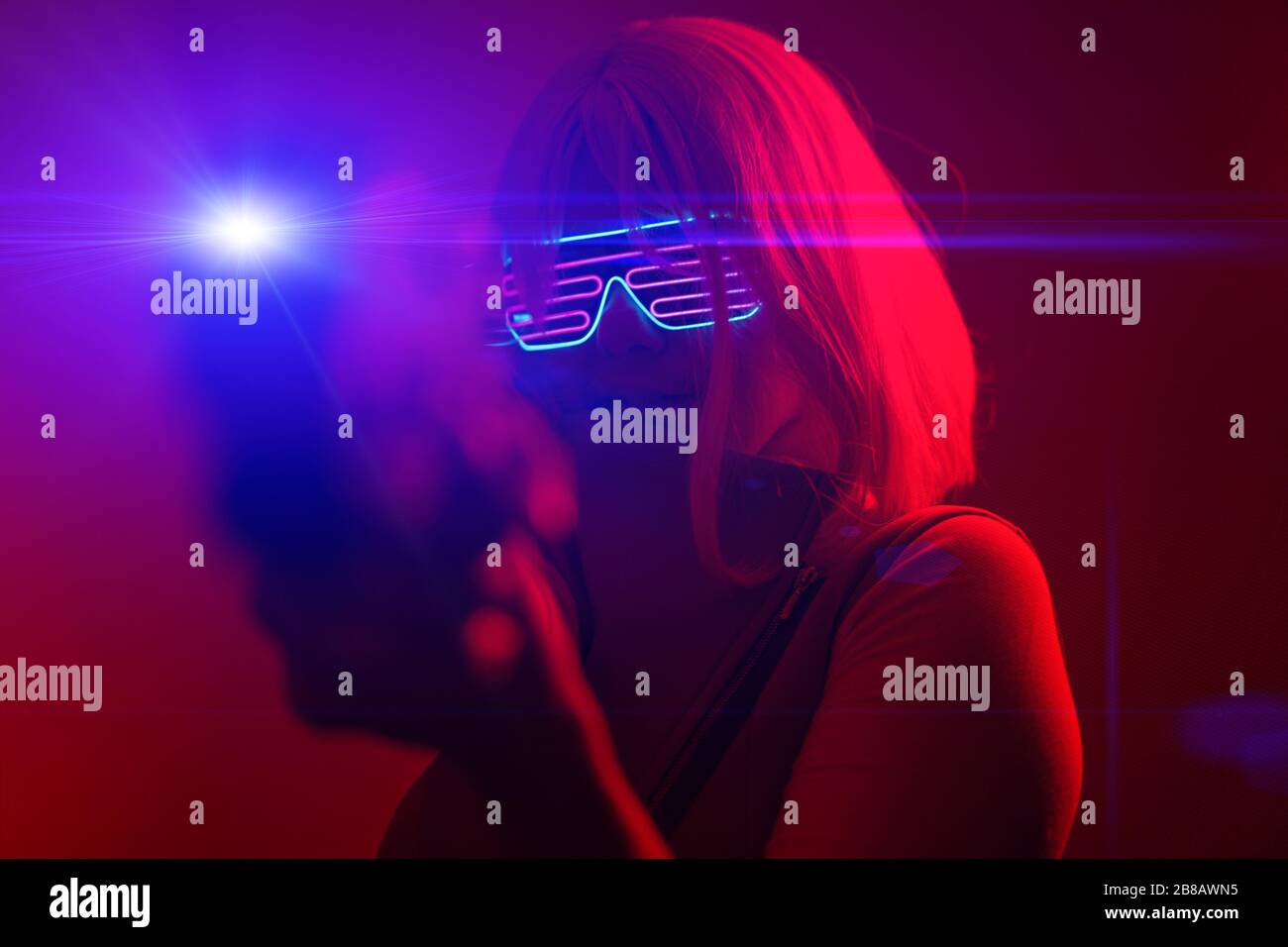 Girl with blaster in the futuristic battle. Concept virtual reality ...