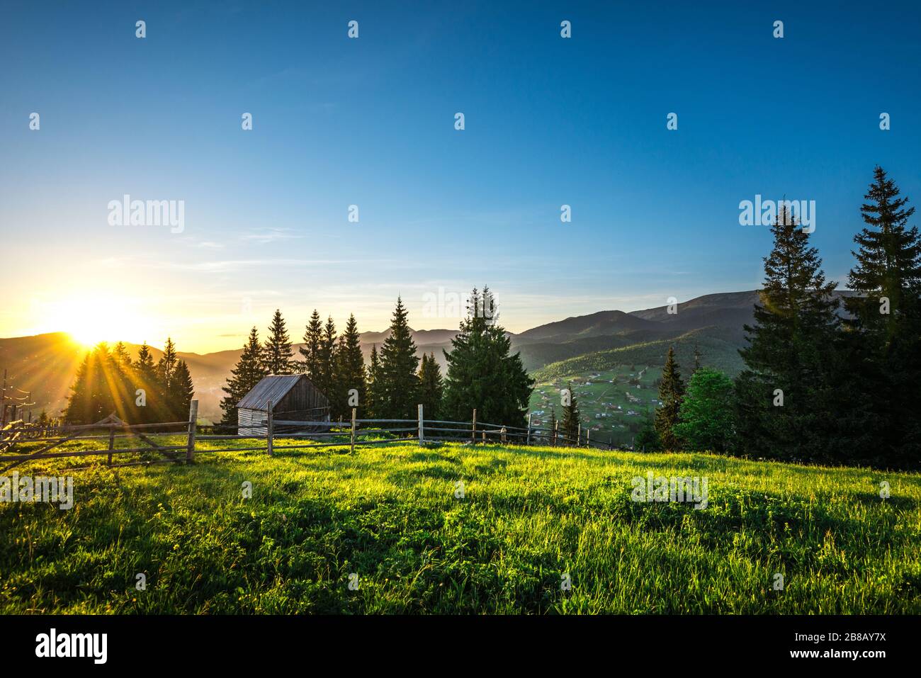Mesmerizing beautiful landscape of hills with green grass on background ...