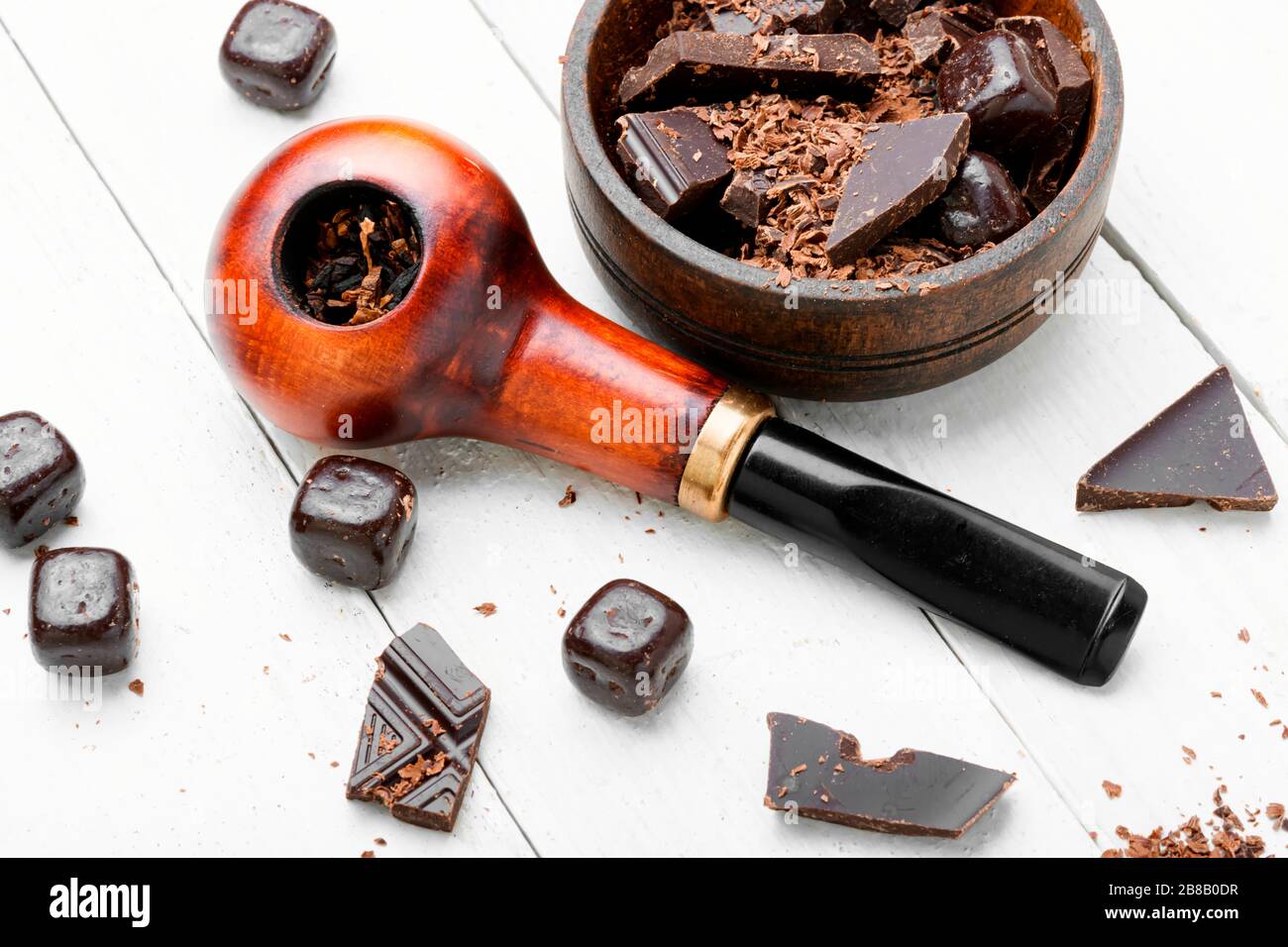 Chocolate flavored tobacco for smoking pipes.Tobacco pipe filled with ...