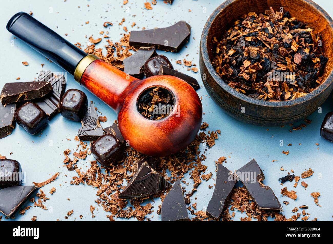 Chocolate flavored tobacco for smoking pipes.Tobacco pipe filled with ...