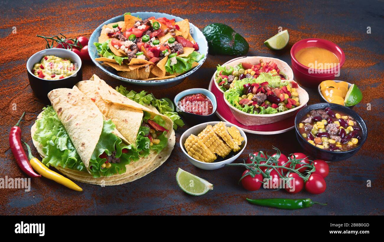 Traditional Mexican food mix on dark background Stock Photo - Alamy