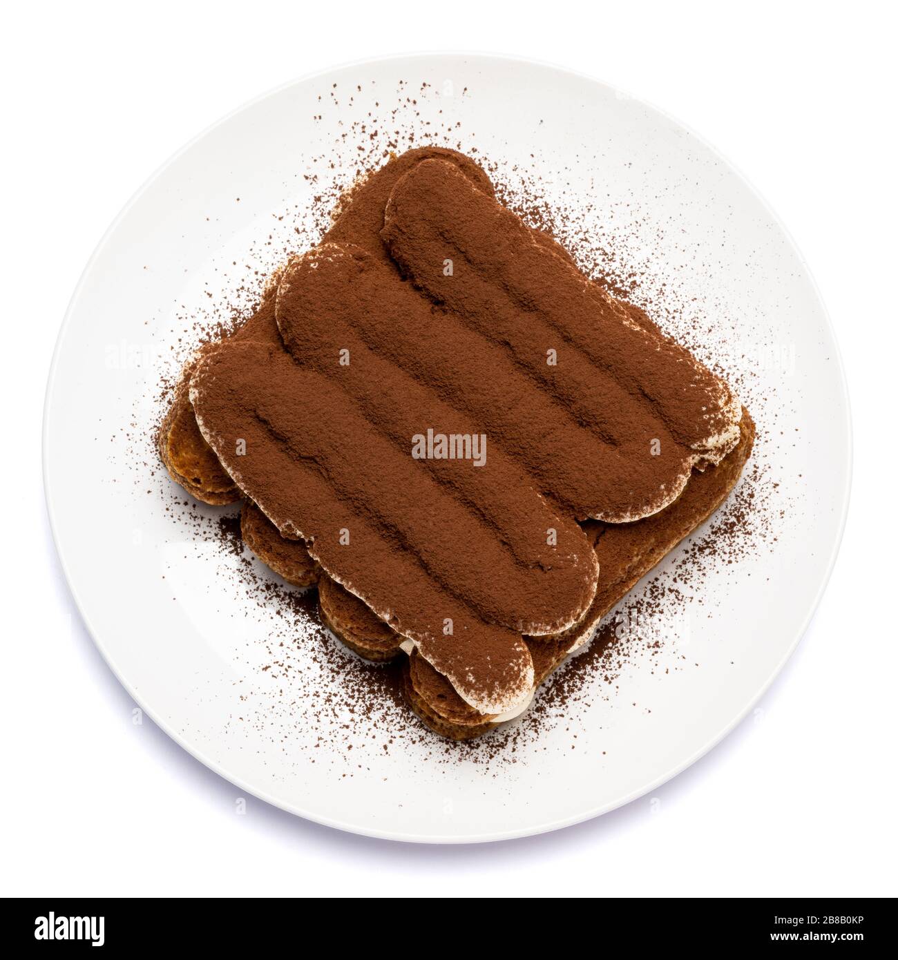 Classic tiramisu dessert on ceramic plate isolated on white background ...