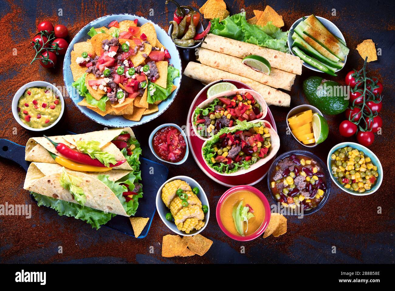 Traditional Mexican food mix on dark background. Top view Stock Photo ...