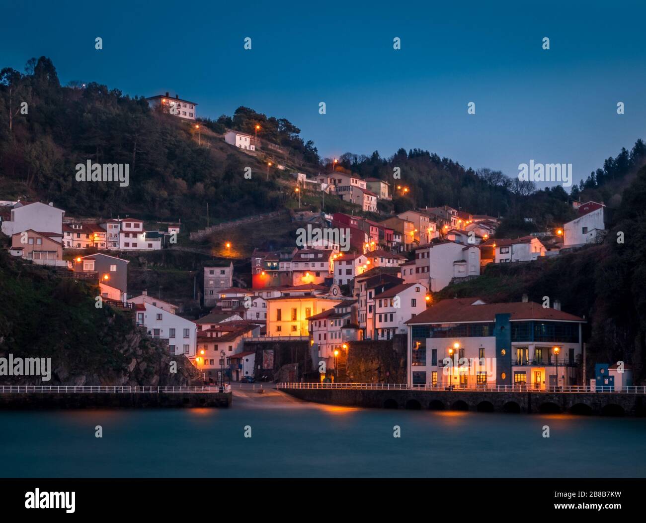 Wide angle shot of the Port of Cudillero in Spain at night Stock Photo ...