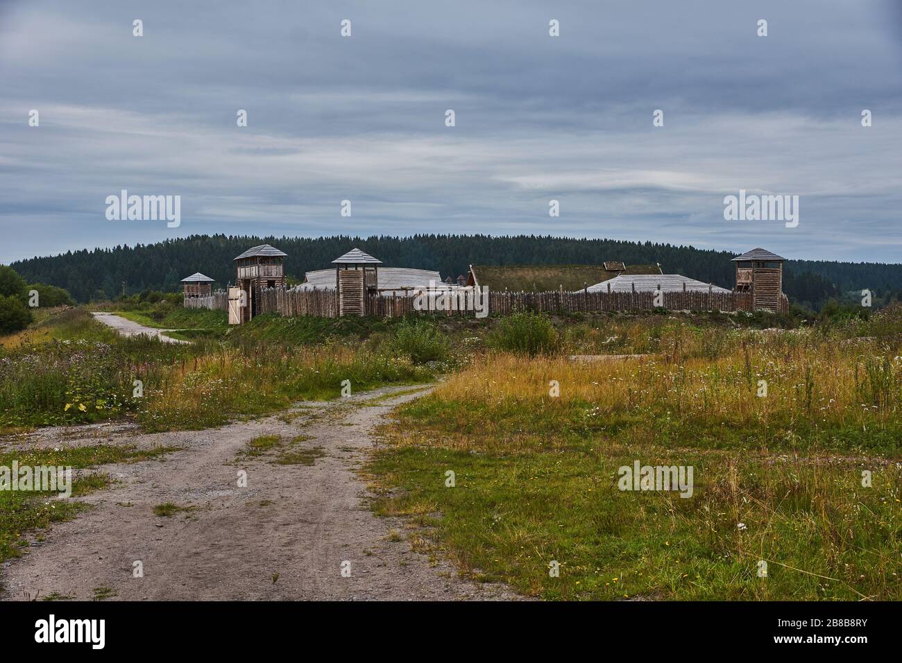 An old military fortress built of coniferous logs. At the corners of ...
