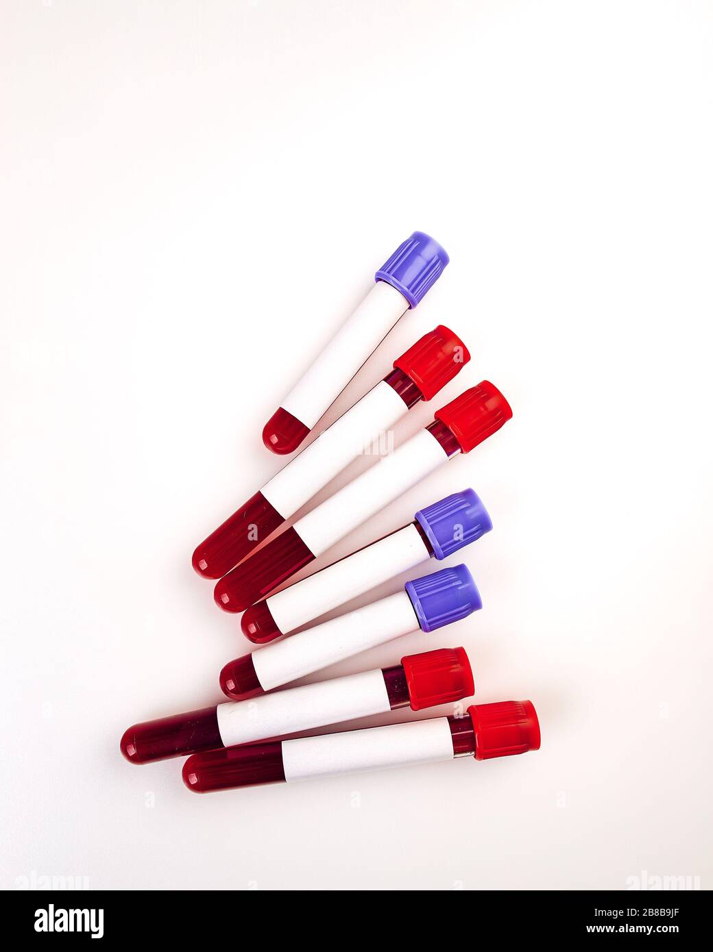 Flat lay of blood tube with sample blood for test with empty label ...