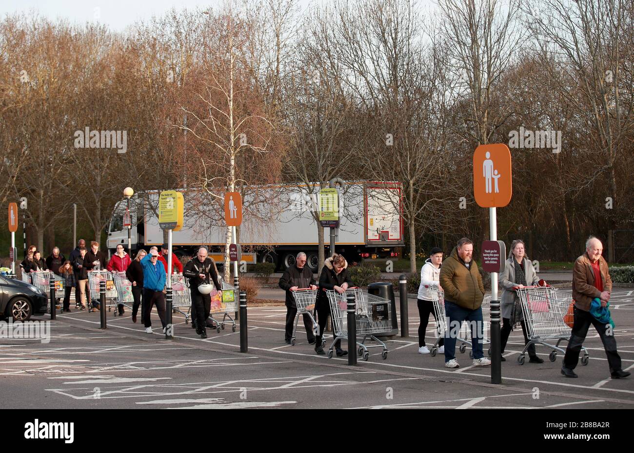 People queuing up outside sainsburys hi-res stock photography and ...