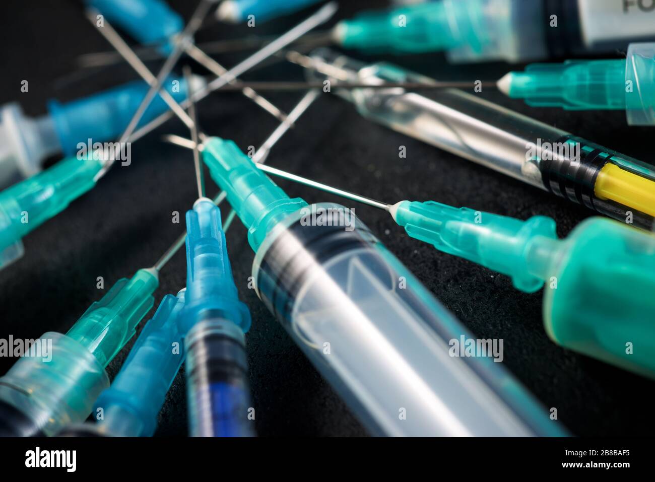 Stacked syringes hi-res stock photography and images - Alamy