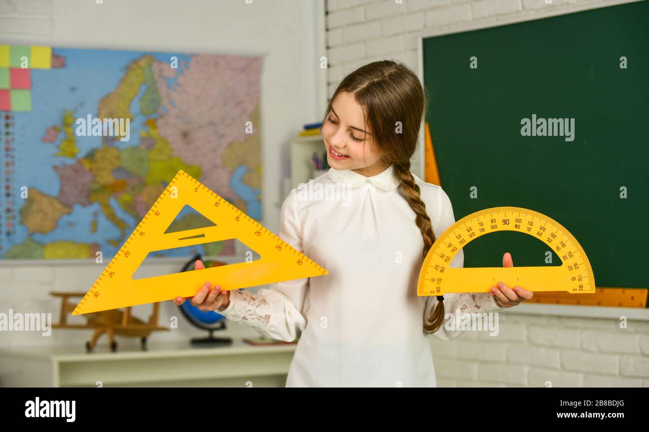 school lesson items. High school student learning geometry in class ...