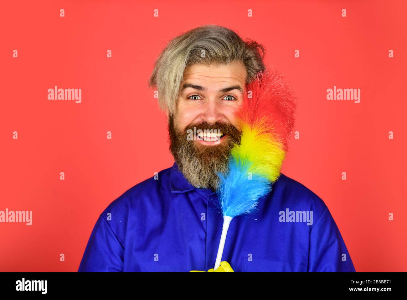 Cleaning apartment. Man use pp duster. Dust allergy. Polypropylene ...