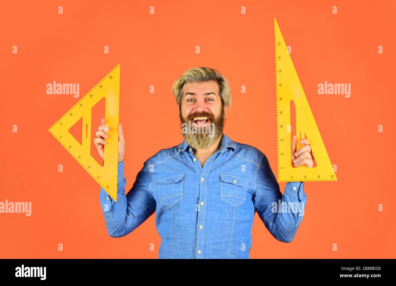 Professional choice. bearded tutor man with ruler. draw and measure ...