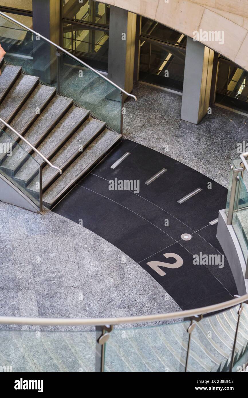 Clock stairs to the parisian metro in Paris Stock Photo - Alamy