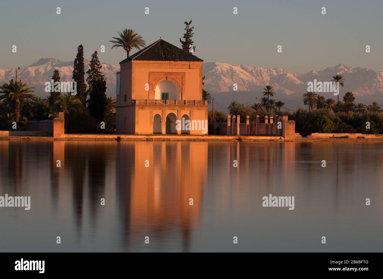 Menara Gardens, Marrakesh in front of the Atlas Mountains in Morocco ...