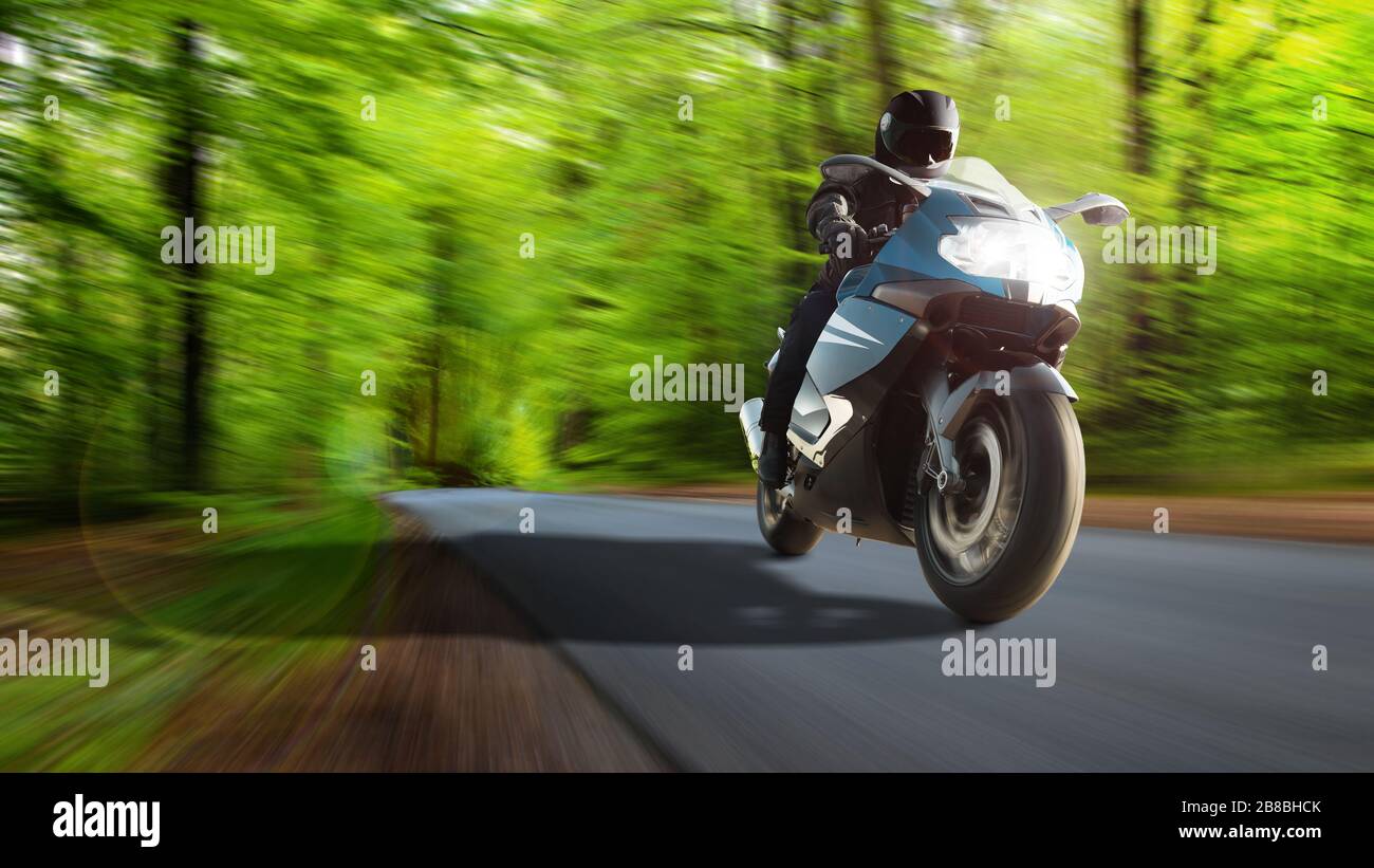 Motorcycle tour on the country road with beautiful spring weather ...