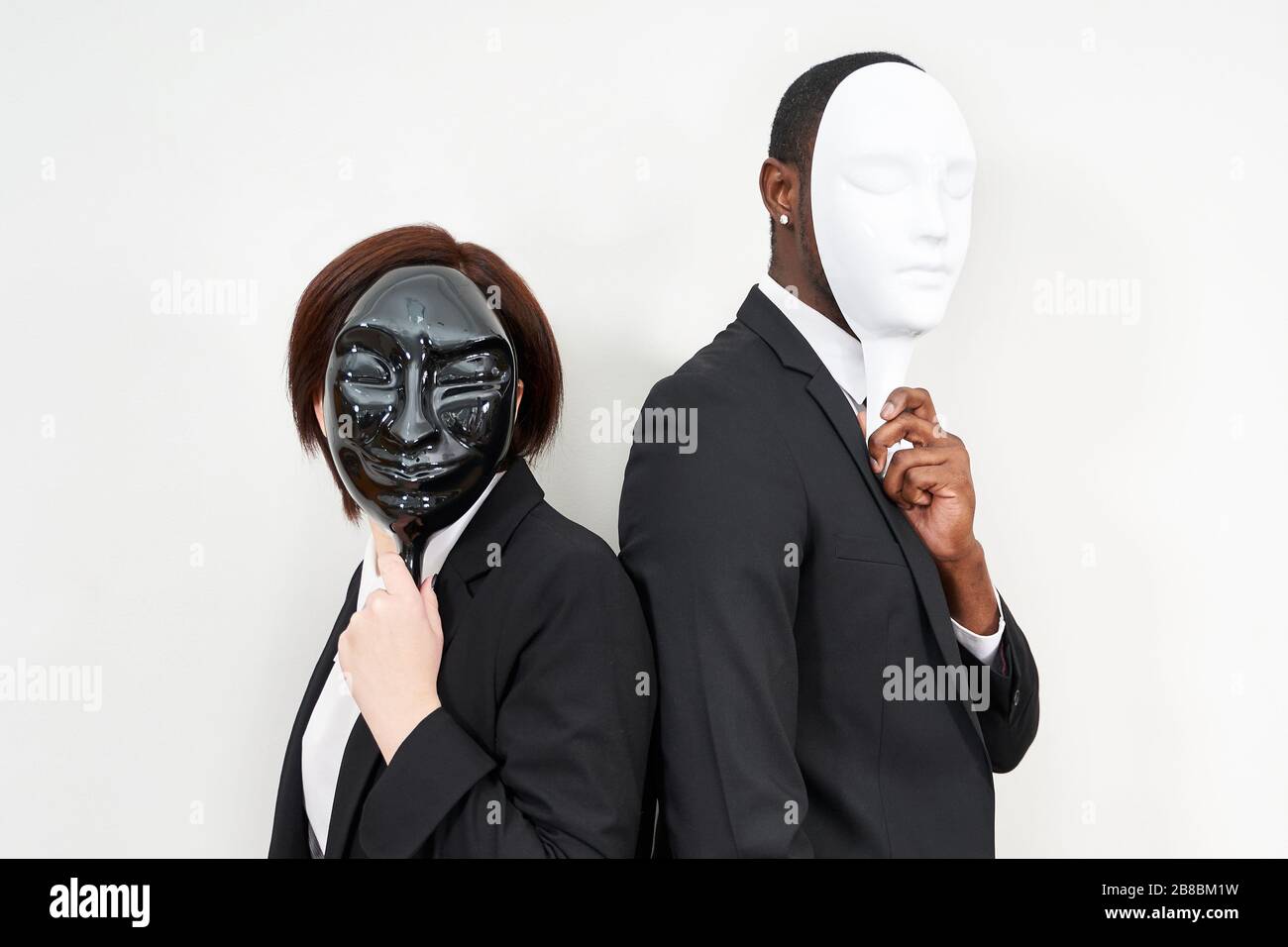 Remove mask anonymous hi-res stock photography and images - Alamy