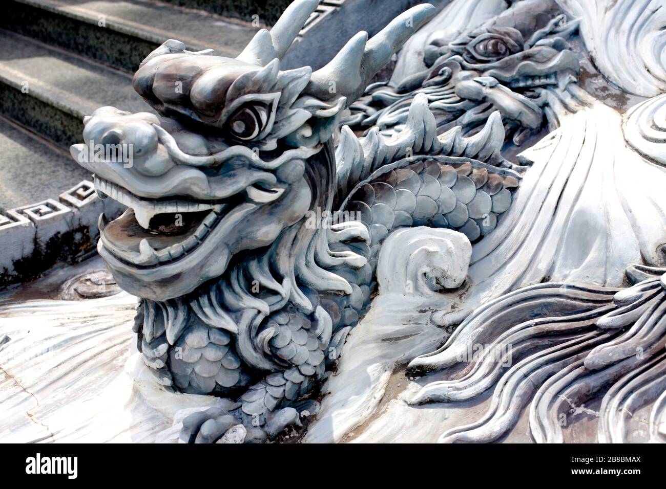 Bas relief asian dragon hi-res stock photography and images - Alamy