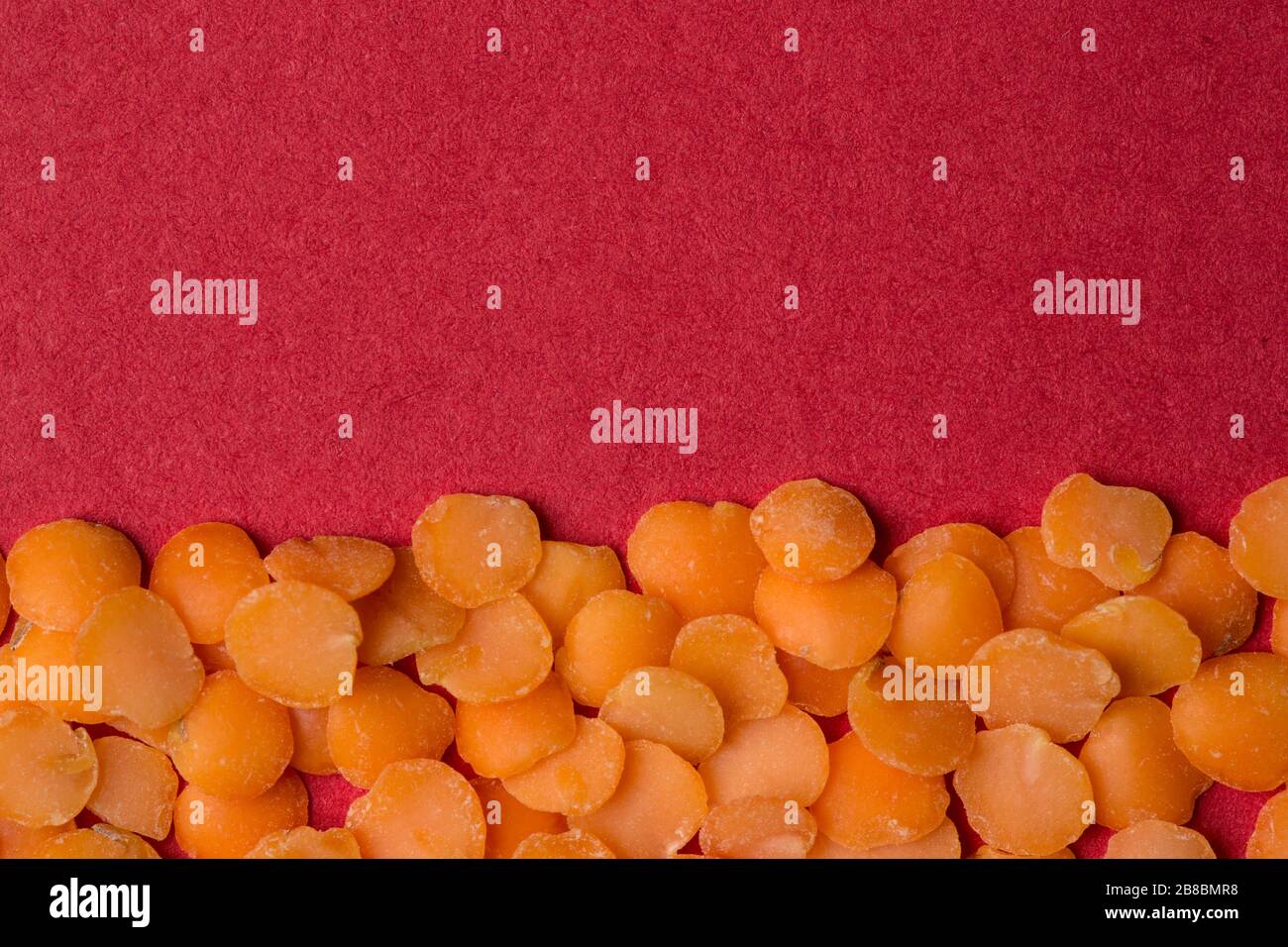 Red lentil close-up background Stock Photo - Alamy