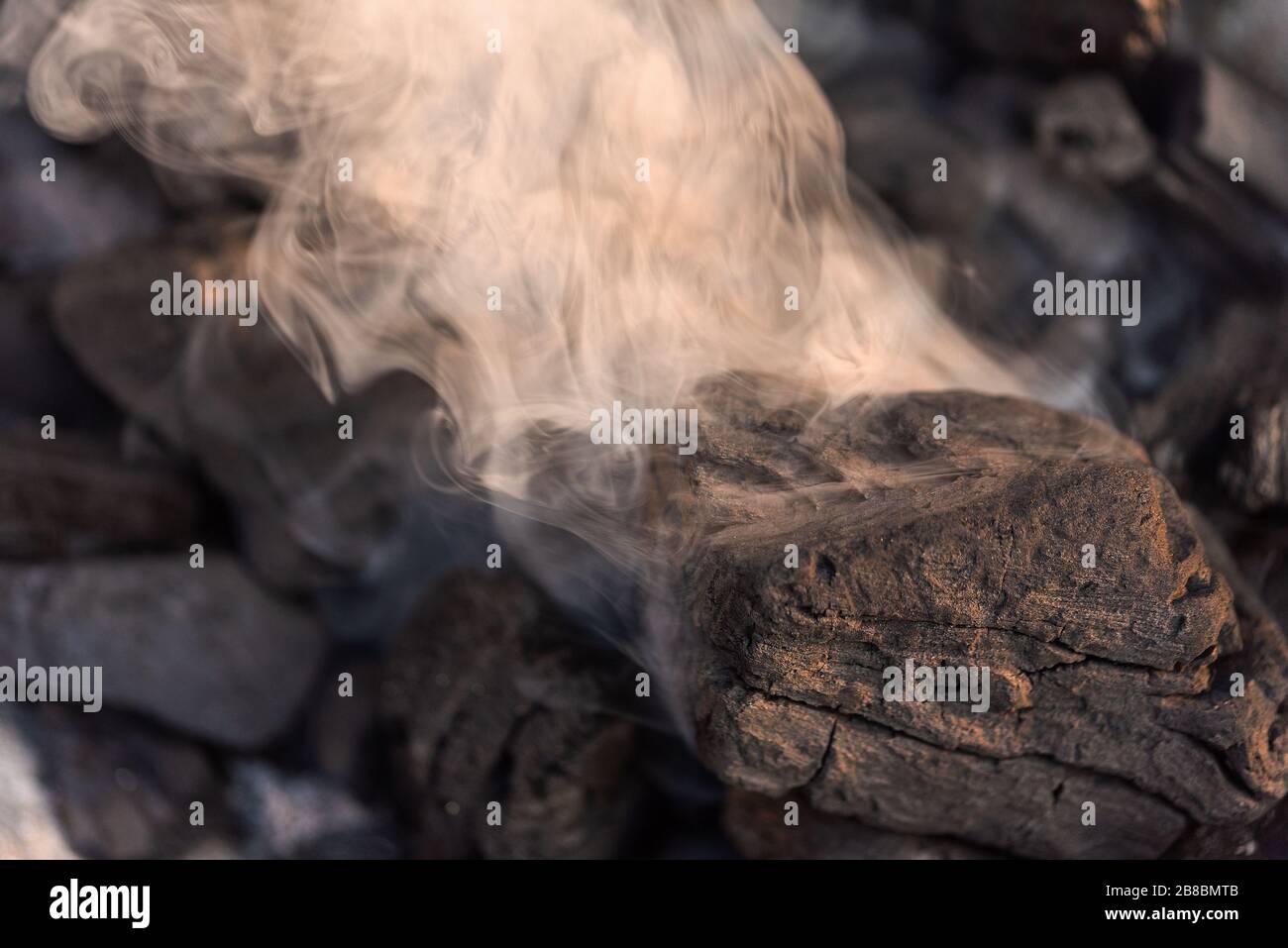 Coal in a cloud of smoke. Coal heating and environmental protection ...