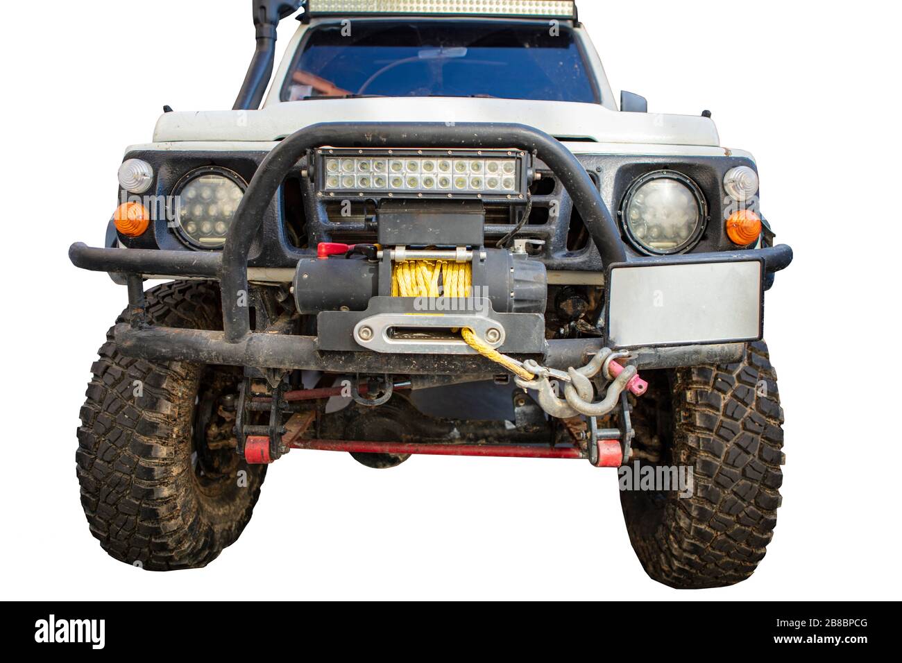 Front view of muddy 4x4 off-road car isolated on a white background ...