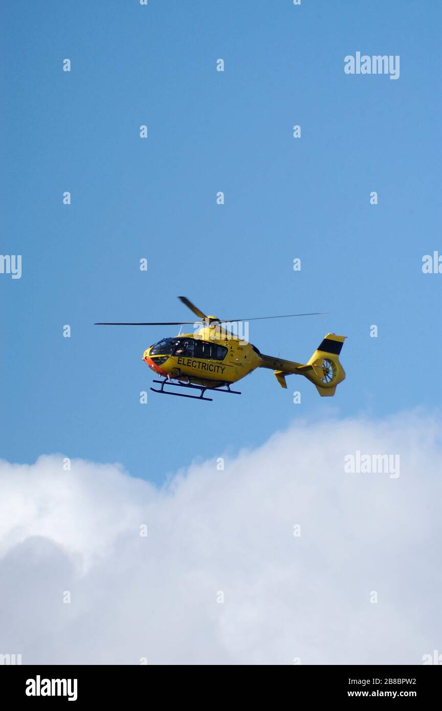 Electricity Helicopter hovering at Work Stock Photo - Alamy