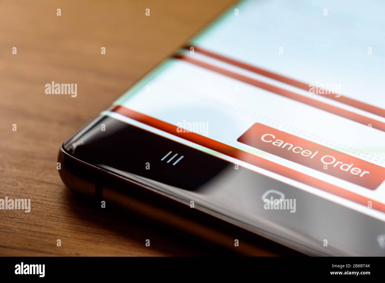 cancel order text button on smart phone screen Stock Photo - Alamy