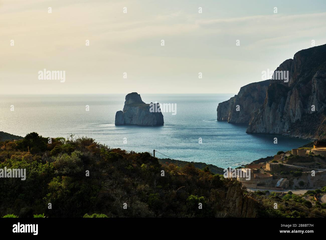 Pan di Zucchero faraglione, a big rock near Masua, Sardinia, Italy ...