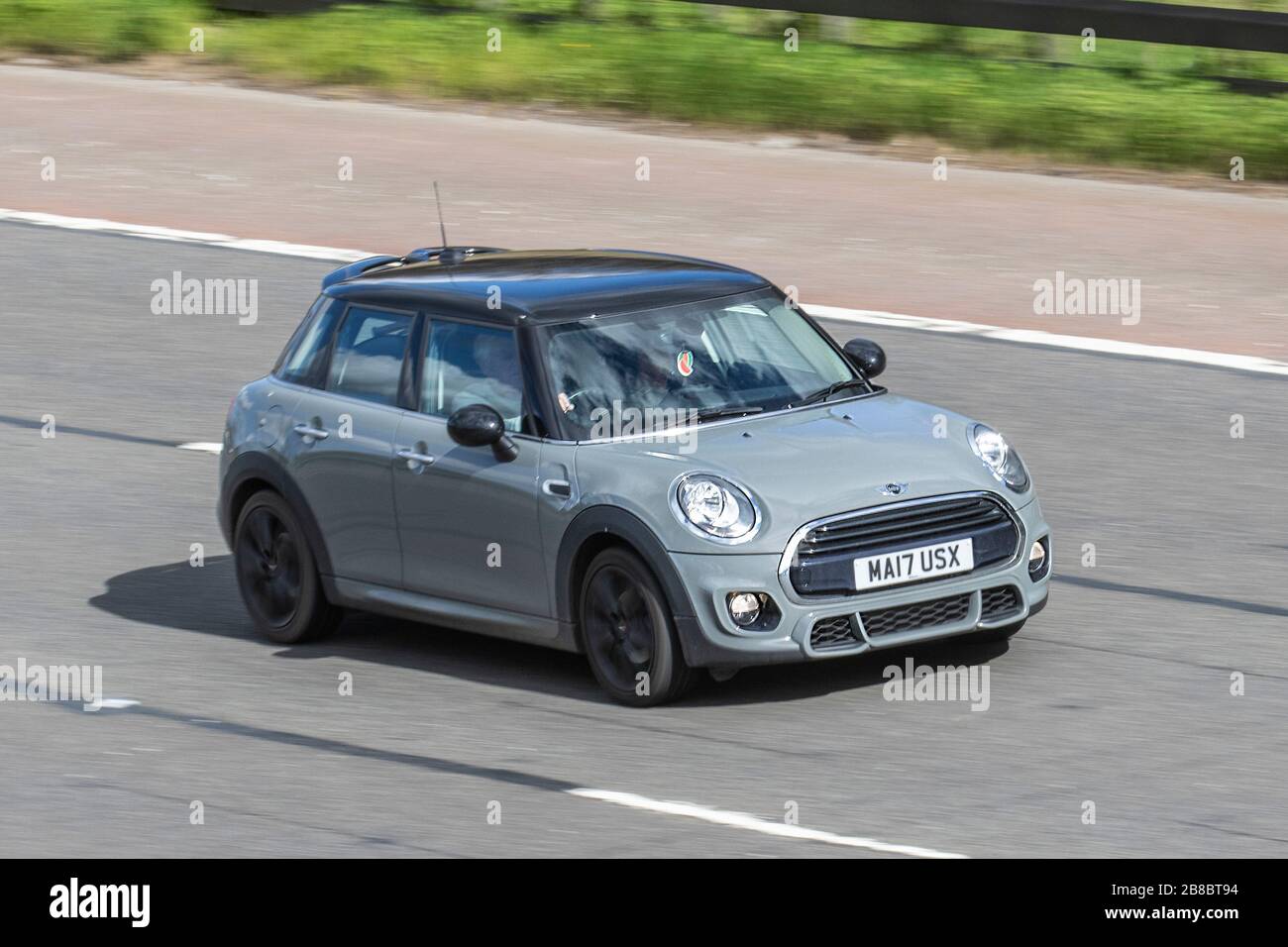 2017 (17) grey Mini Cooper; UK vehicular traffic, transport, moving ...