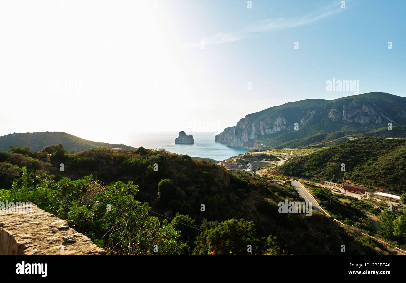 Pan di Zucchero faraglione, a big rock near Masua, Sardinia, Italy ...