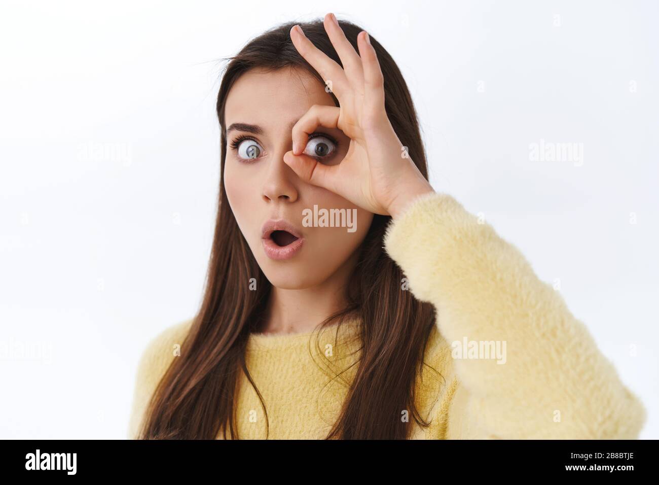 Wow awesome. Close-up portrait of speechless impressed woman seeing ...