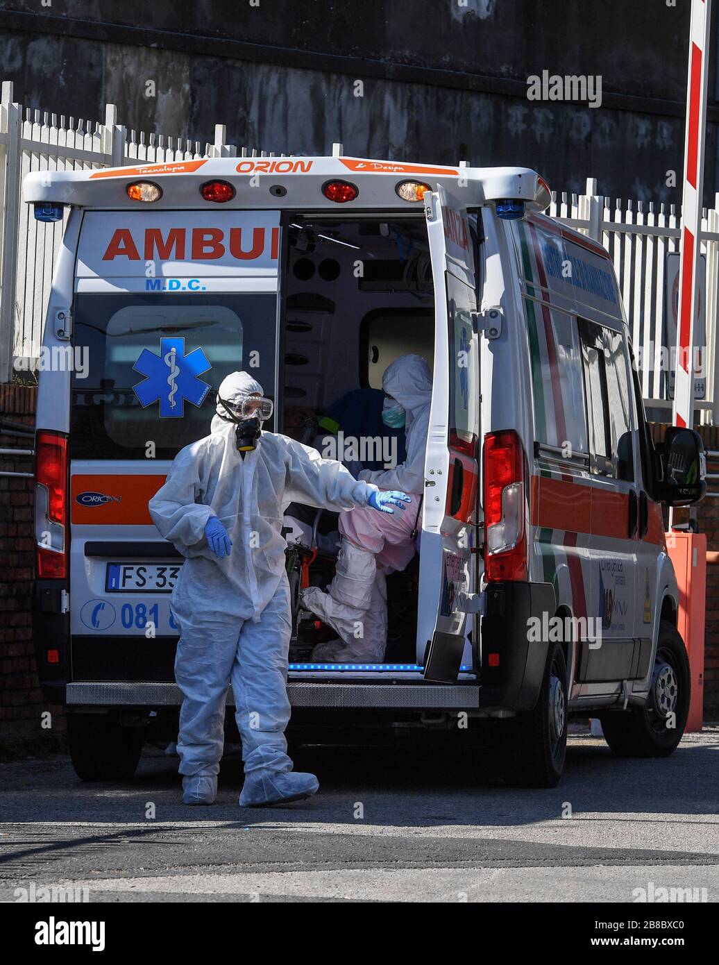 Naples, Italy. 21st Mar, 2020. Paramedical opens the ambulance out ...