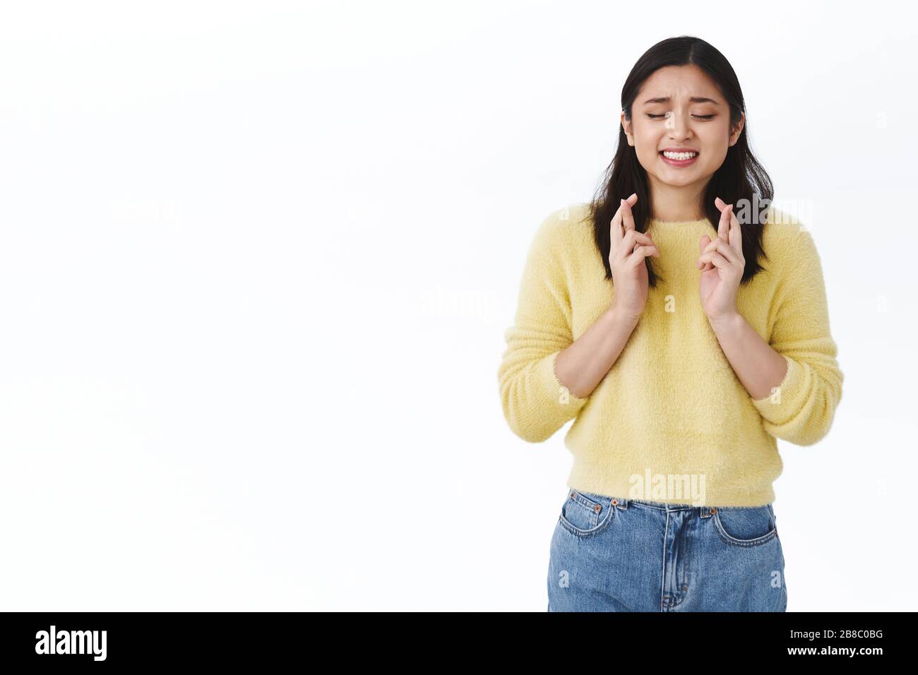 Anxious cute asian female student worried abour bad mark on test, cross ...