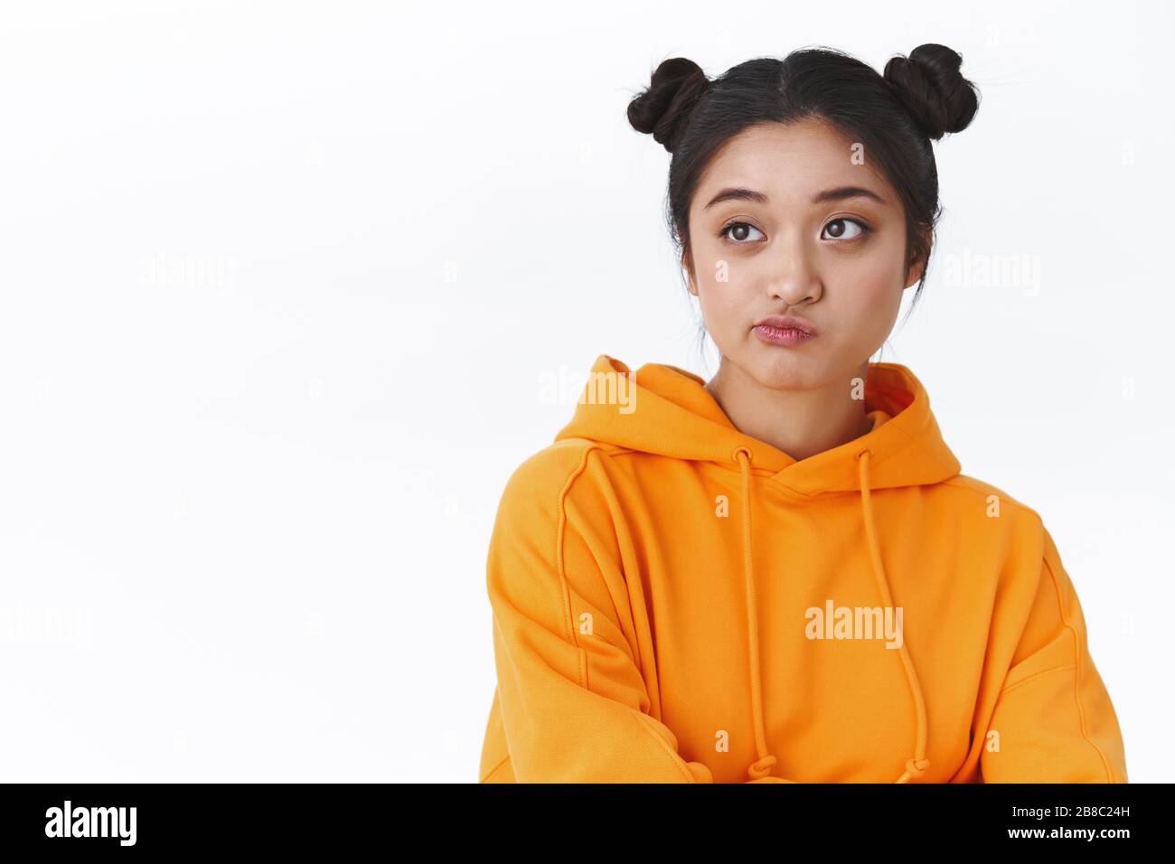 Waist-up portrait indecisive spaced-out cute asian girl thinking about ...