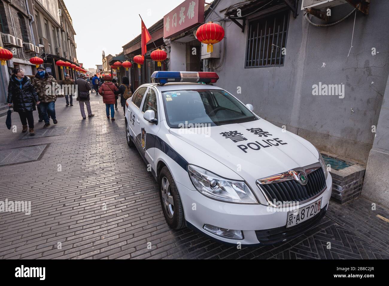 Police car in Qianmen Street area in Beijing, China Stock Photo - Alamy