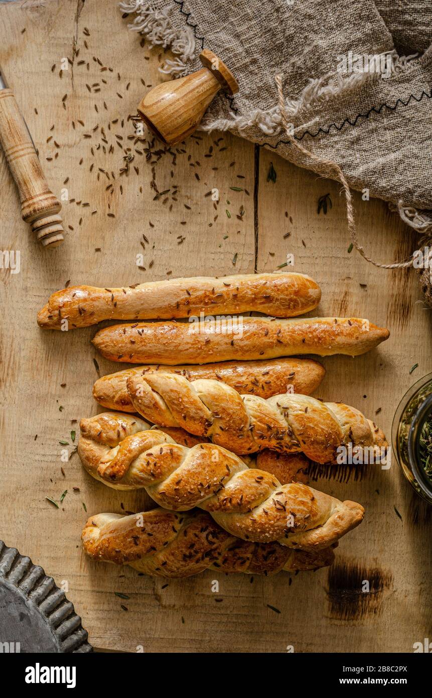 Delicious homemade salted sticks with cumin and sea salt Stock Photo ...