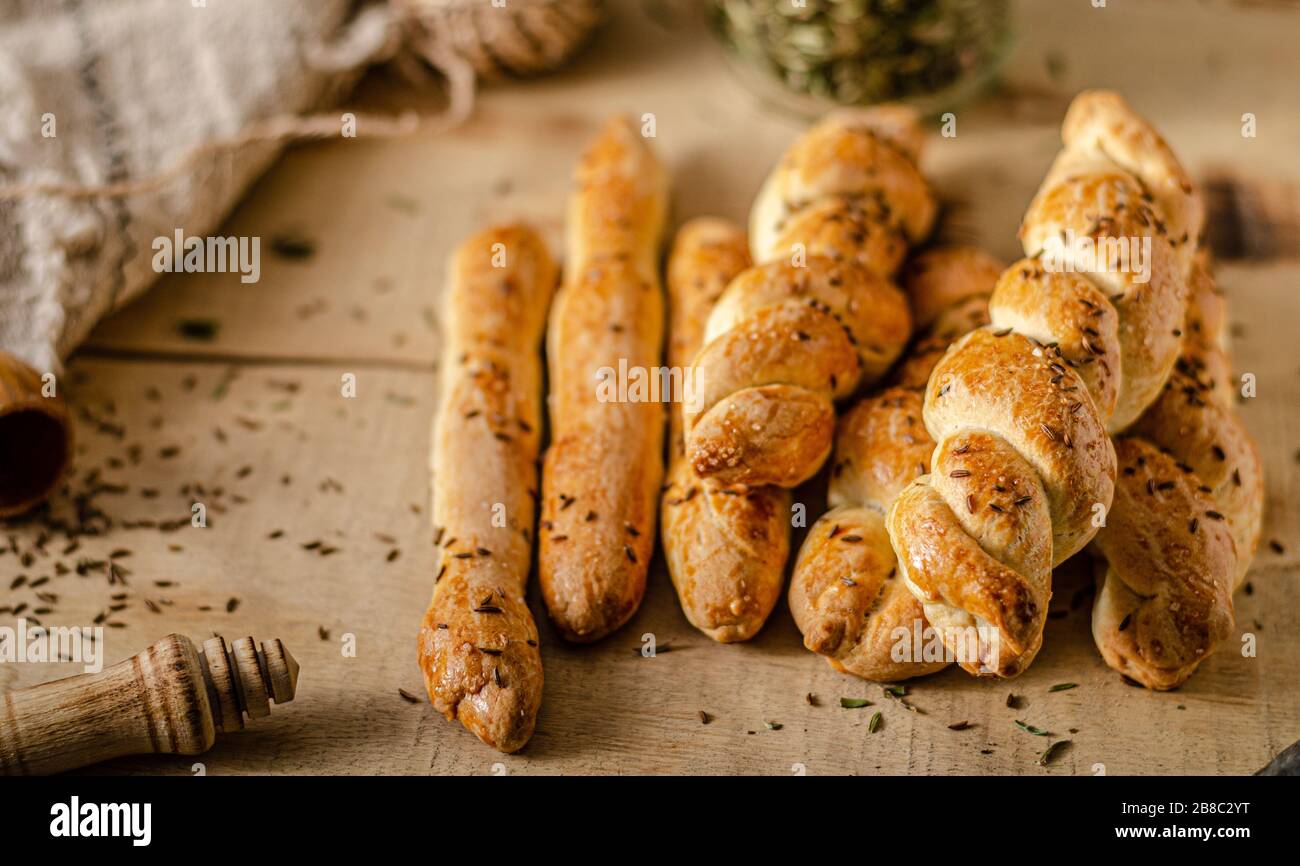 Delicious homemade salted sticks with cumin and sea salt Stock Photo ...
