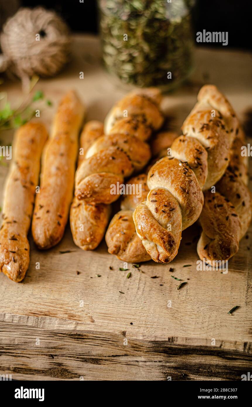 Delicious homemade salted sticks with cumin and sea salt Stock Photo ...