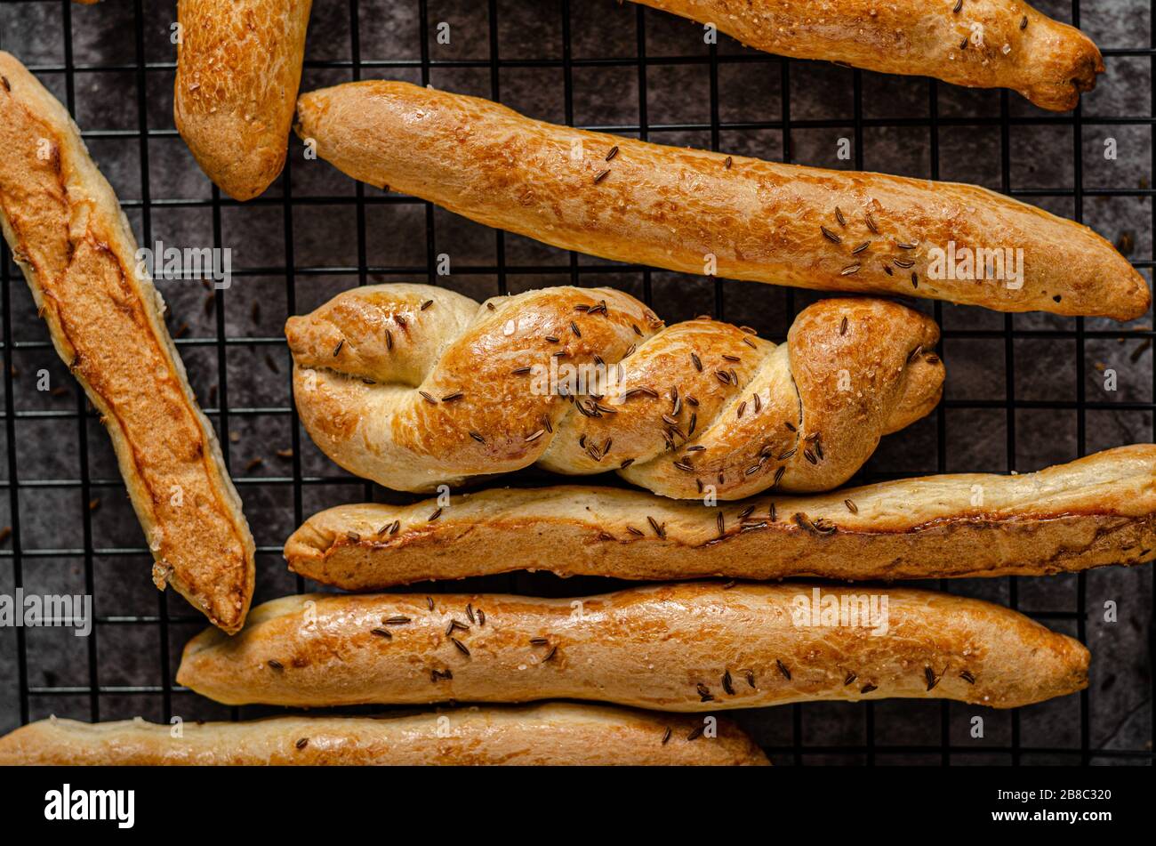 Delicious homemade salted sticks with cumin and sea salt Stock Photo ...