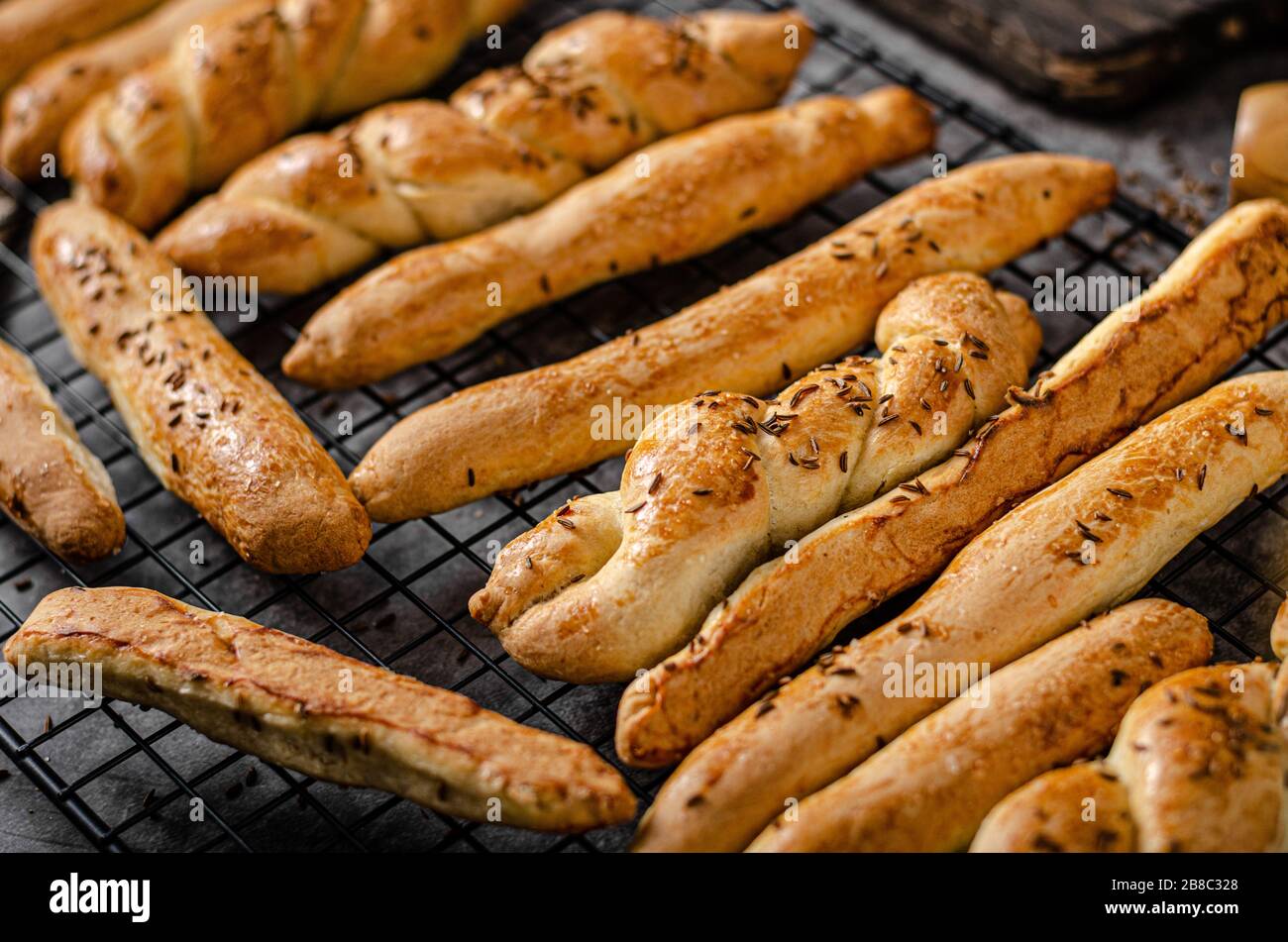 Delicious homemade salted sticks with cumin and sea salt Stock Photo ...