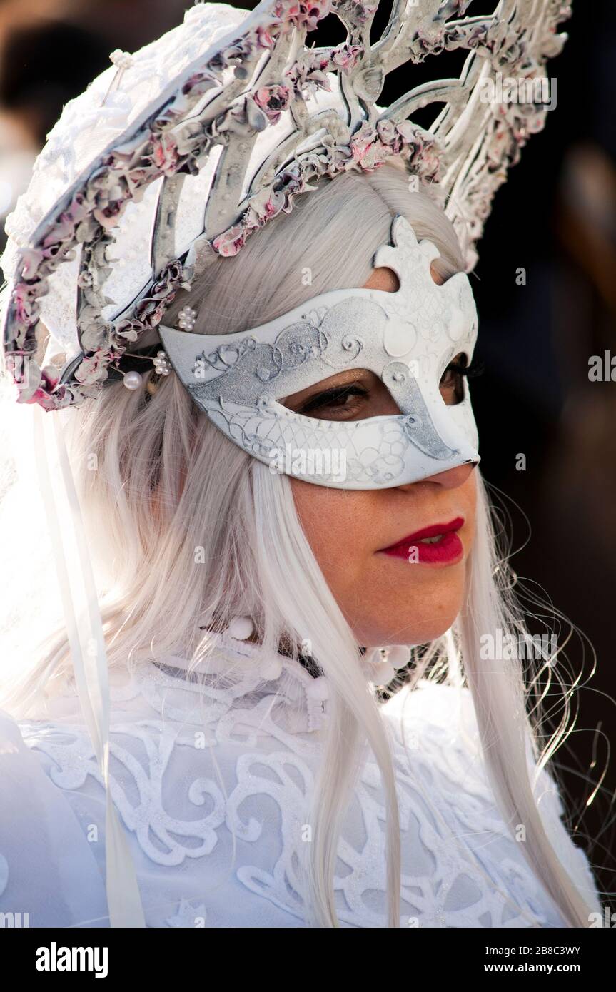 Venice Carnival characters in a colorful brown and gold Carnival ...