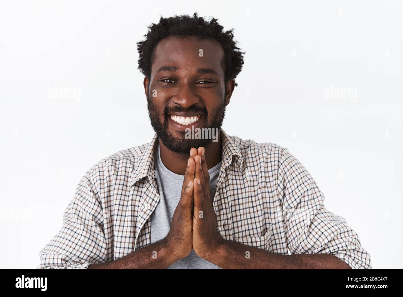 Cute african-american guy asking some favour, pleading or begging for ...